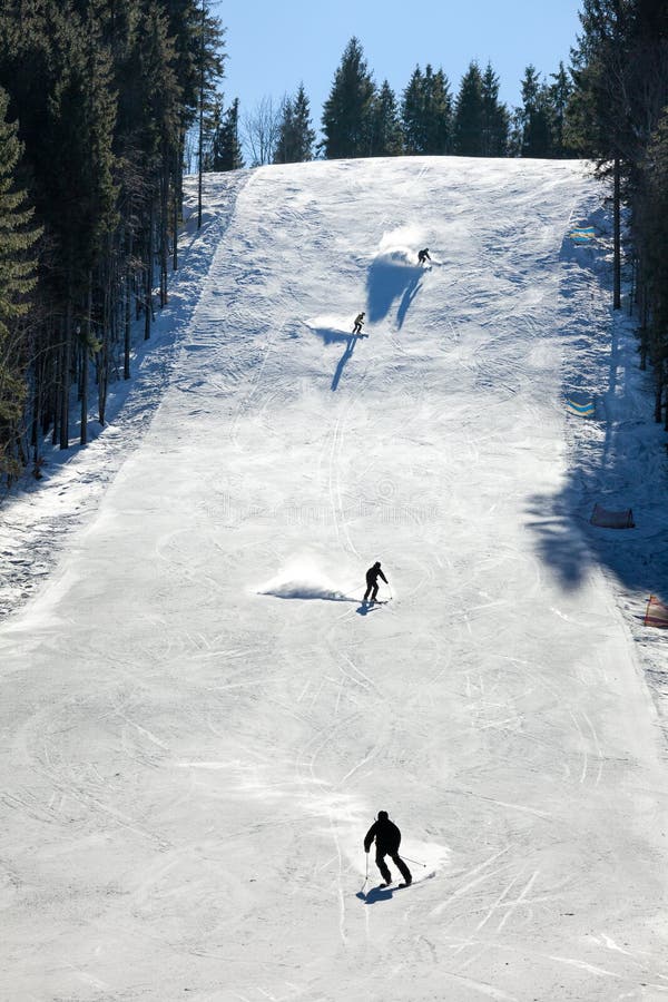 Skiers on a piste stock image. Image of rock, italy, leisure - 33695367