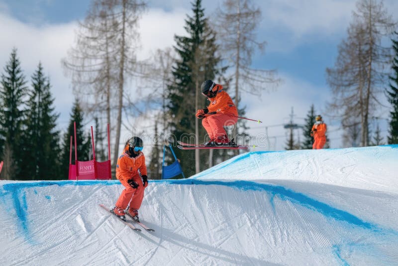 Skiers Training and Jumping on Snowy Slope in Winter Stock Illustration ...