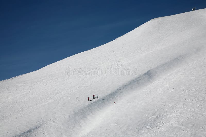 Skiers on wide track stock photo. Image of mountain, resort - 13399022