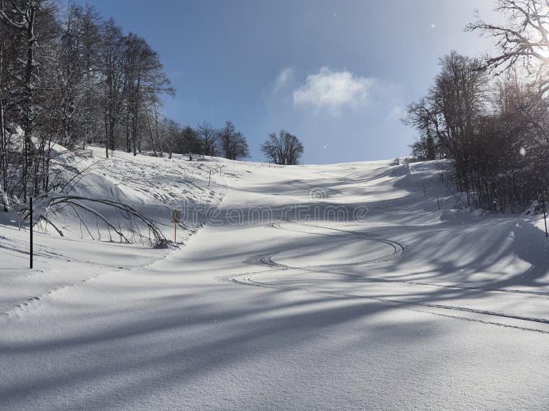 Skiing Turns Traces on Fresh Snow. Winter Landscape Stock Image - Image ...