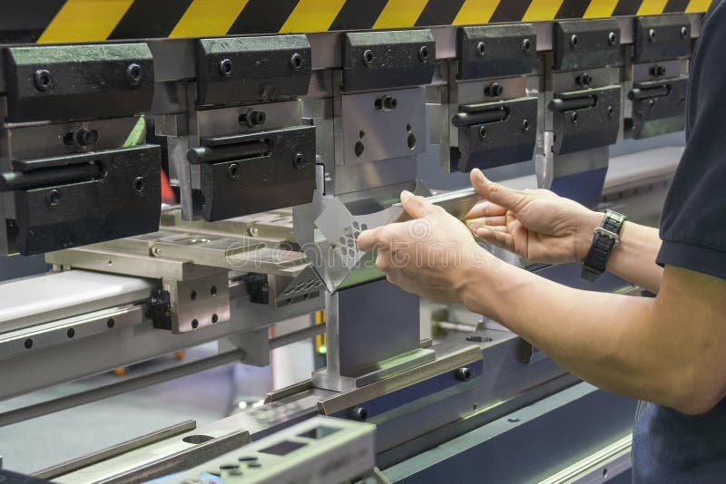 The Skill Operator Working with Hydraulic Press Brake Bending Machine ...