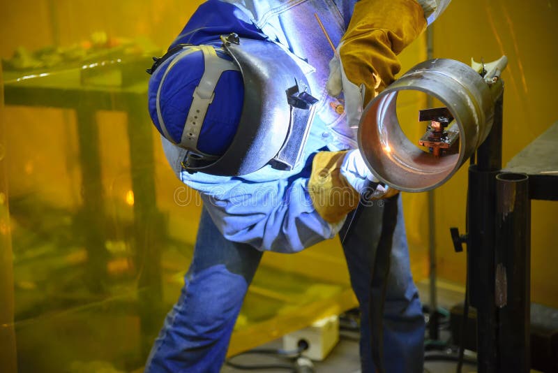 Skill Welding Operator Welding the Steel Pipe Stock Image - Image of ...