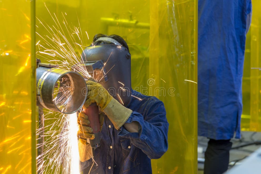 The Skill Worker Use Hand Grinding Machine Stock Image - Image of ...