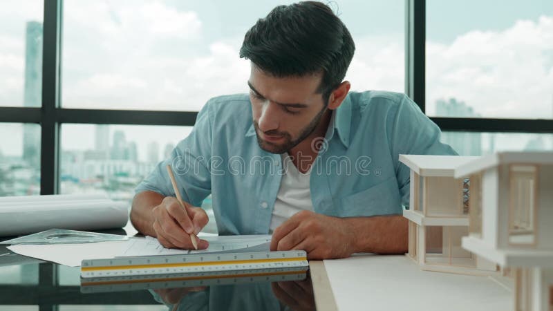 Skilled Architect Engineer Writing House Construction on Blueprint ...