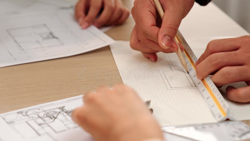 Skilled Architect Hand Writing a Detail of Blueprint. Focus Hand ...
