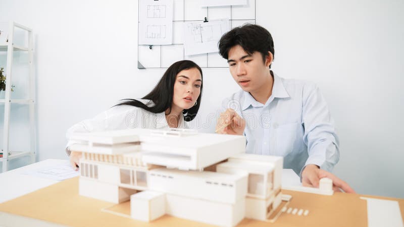 Skilled Architecture Engineer Team Inspect and Decide House Model ...