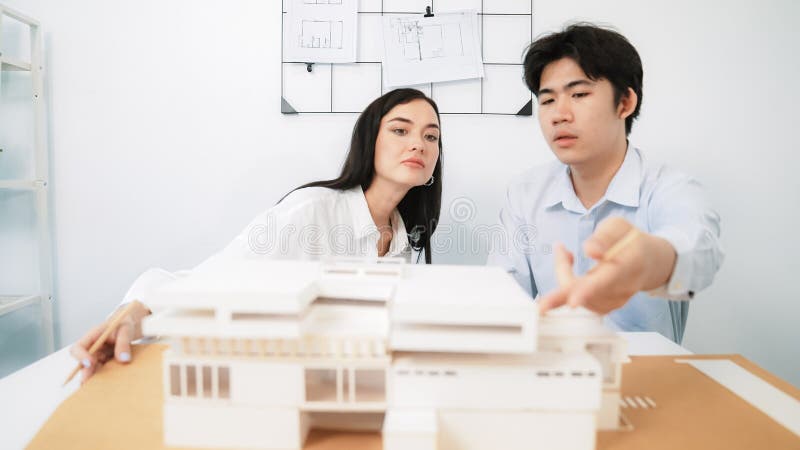 Skilled Architecture Engineer Team Inspect and Decide House Model ...