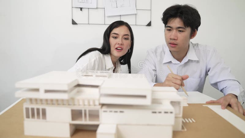 Skilled Architecture Engineer Team Measure and Decide House Model ...