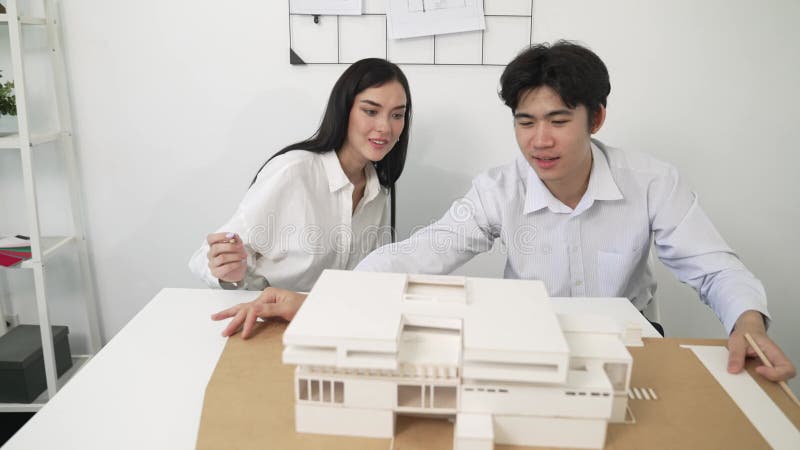 Skilled Architecture Engineer Team Measure and Decide House Model ...