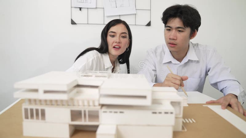 Skilled Architecture Engineer Team Measure and Decide House Model ...