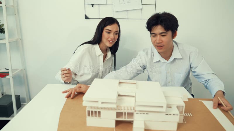 Skilled Architecture Engineer Team Measure and Decide House Model. Immaculate. Stock Video ...