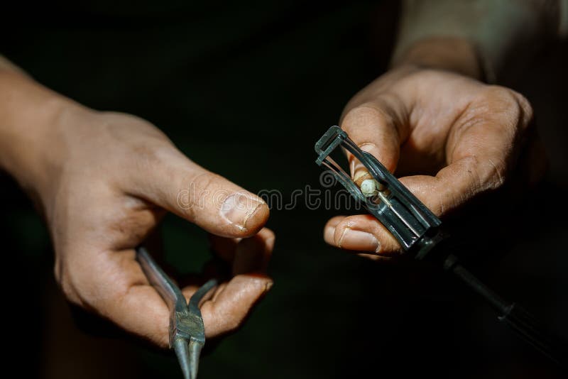 Skilled Artisan Repairing Mechanical Component with Precision Tools ...