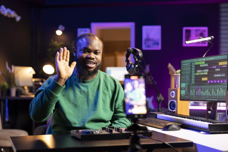 Skilled Audio Engineer Teaching Mixing Tunes Lessons by Using a ...