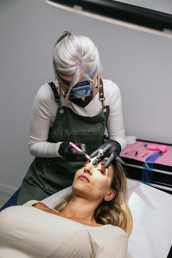 Professional Microblading Procedure in Modern Cosmetic Studio Stock ...