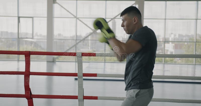 Skilled Boxer Practicing Punches Hitting Air Shadow Fighting in Boxing ...