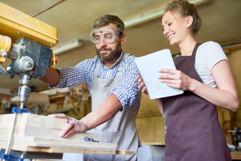 Skilled Carpenter Working with Drilling Machine Stock Image - Image of ...