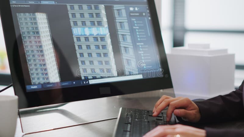 Skilled Designer Using Editing Software on Dual Monitors in Organized ...