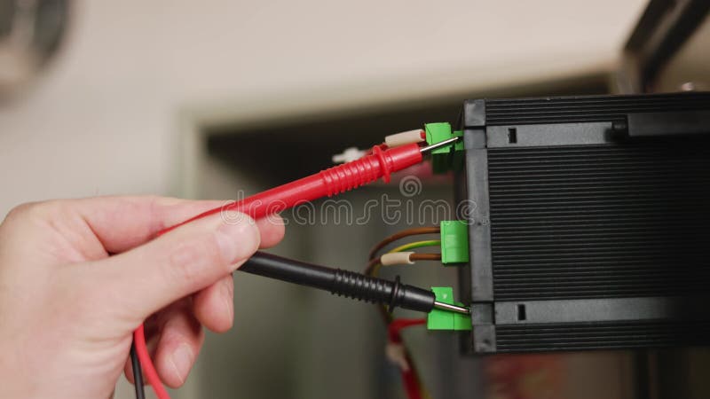 Electrician Tests Switchboard at Substation, in Gear Checking Voltage ...