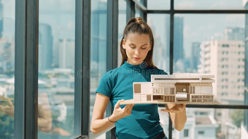 Skilled Engineer Check House Model by Turning Left and Right Side ...