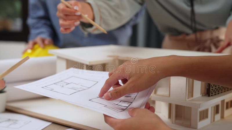 Skilled Interior Designer Team Focusing on Their Performance ...