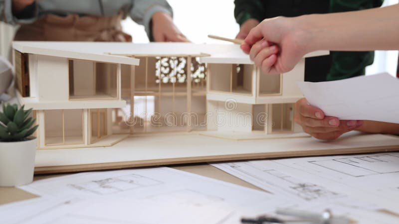 Skilled Interior Designer Team Focusing on Their Performance ...