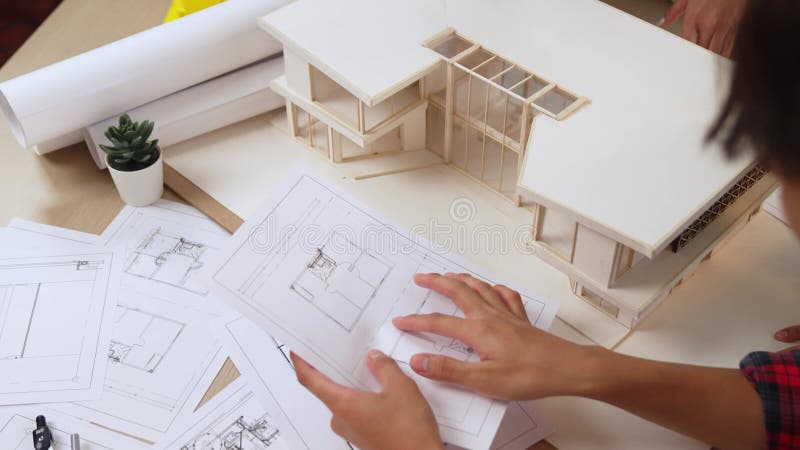 Skilled Interior Designer Team Focusing on Their Performance ...