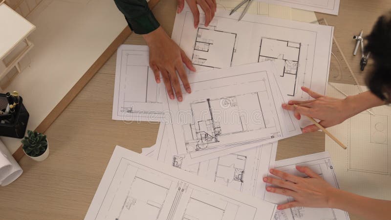 Skilled Interior Designer Team Focusing on Their Performance ...