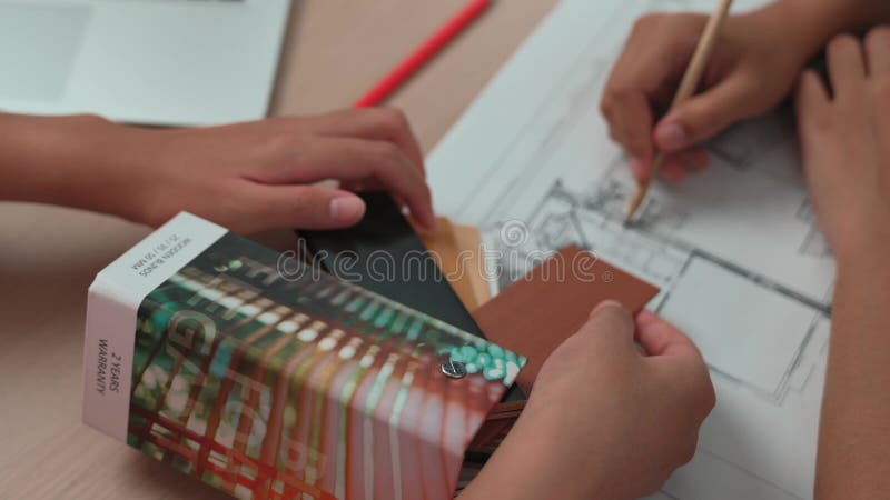 Skilled Interior Designer Team Focusing on Their Performance ...