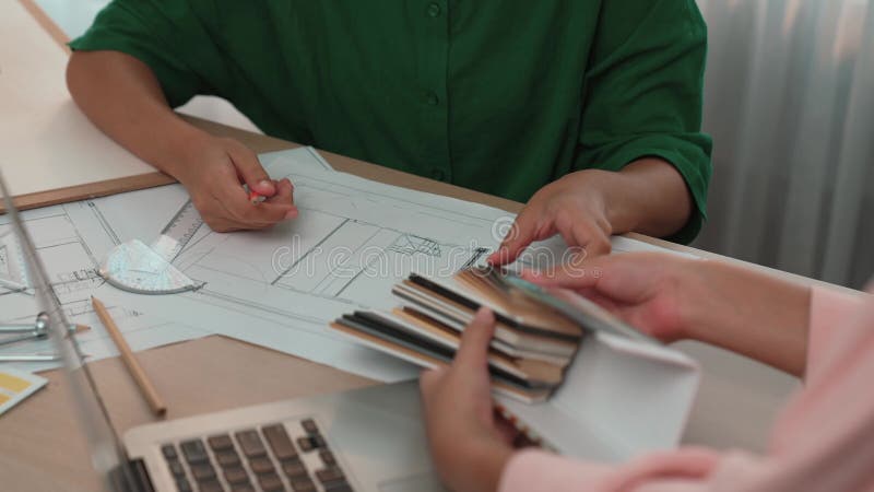 Skilled Interior Designer Team Focusing on Their Performance ...