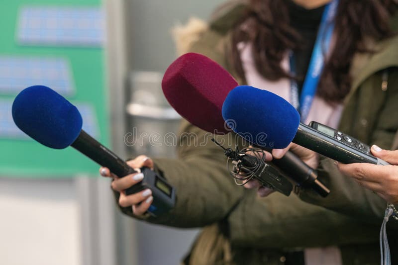 Skilled Journalist Delves into a Captivating Event Interview Stock ...