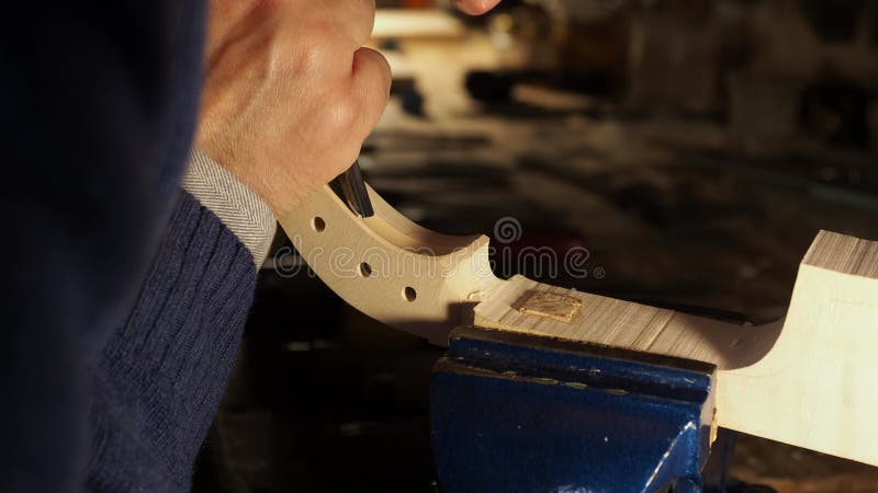Luthier Carefully Carving Violin Neck in Workshop Stock Video - Video ...