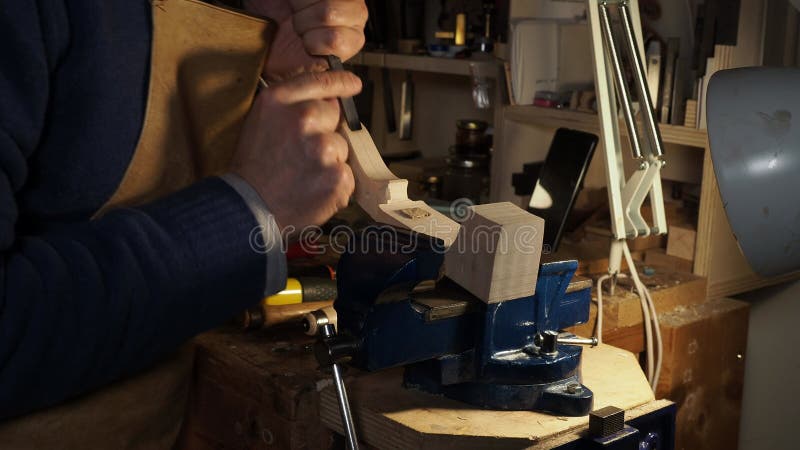 Luthier Carefully Carving Violin Neck in Workshop Stock Video - Video ...