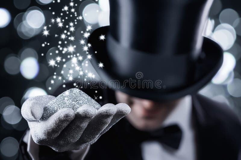 Skilled Magician in Top Hat Dazzles Audience by Making Sparkling ... Skilled Magician in Top Hat Dazzles Audience by Making Sparkling ...