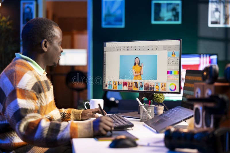 Skilled Male Designer Using Editing Software on Dual Monitors Stock ...