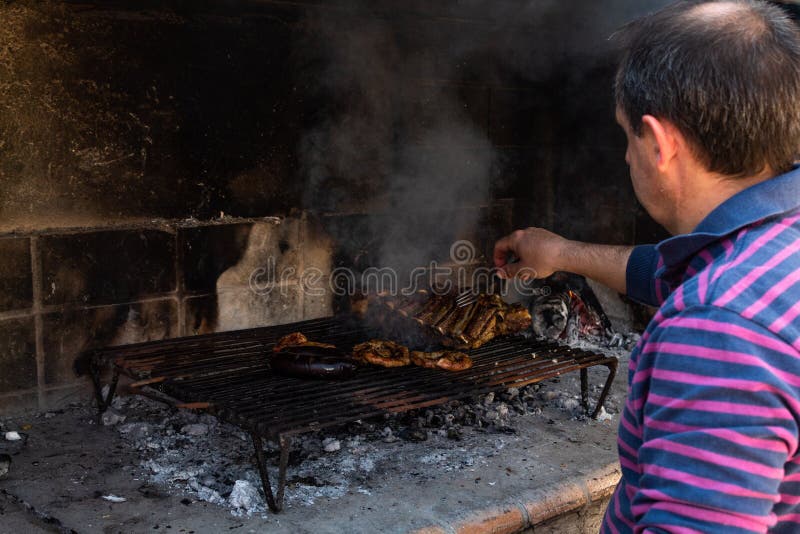 Skilled Man Cooking a Roasted Meat Stock Image - Image of appetizing ...