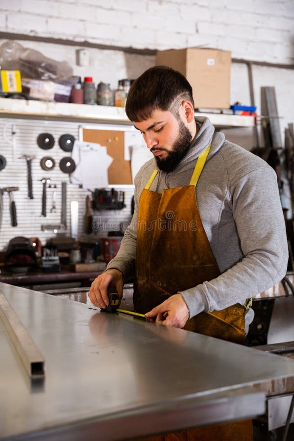 Skilled Man Worker Working with Measuring Tape Stock Photo - Image of ...