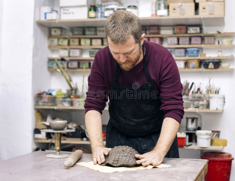 Skilled Master Preparing Clay Workpieces for New His Creations Stock ...