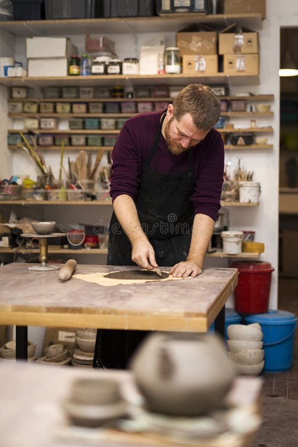 Skilled Master Preparing Clay Workpieces for New His Creations Stock ...