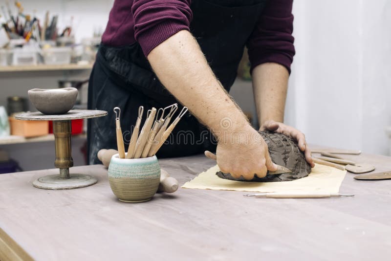 Skilled Master Preparing Clay Workpieces for New His Creations Stock ...