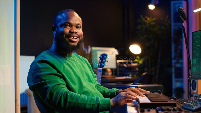 Skilled Music Producer Creating New Songs on Midi Controller Synthesizer Stock Photo - Image of ...