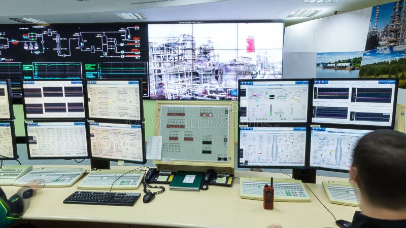People at Monitors Check Process at Gas Refinery Plant Stock Footage ...