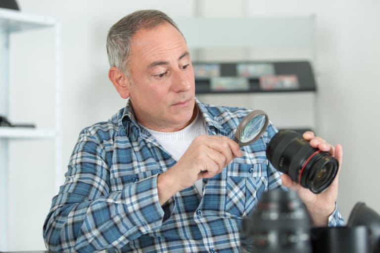 Skilled Photographer Checking Lens Stock Photo - Image of copyspace ...