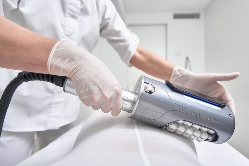 Professional Body Contouring Treatment Being Administered in a Modern ...