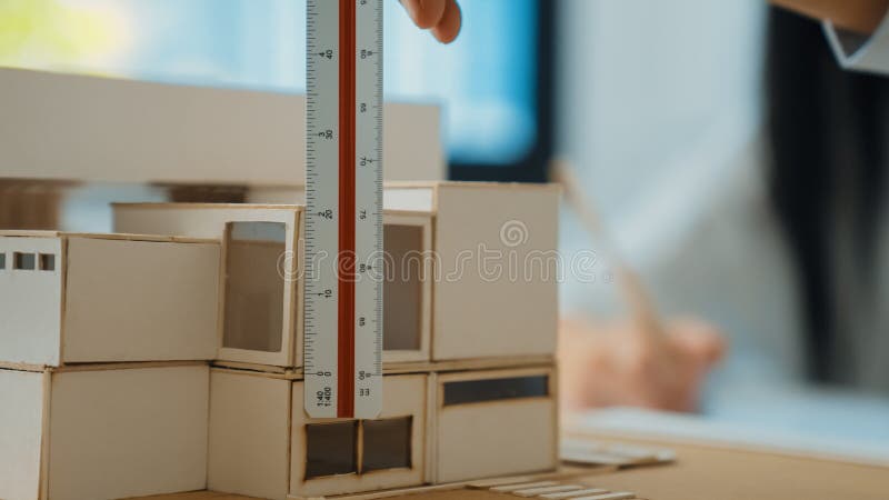 Skilled Professional Engineer Hand Using Ruler Measures House Model ...
