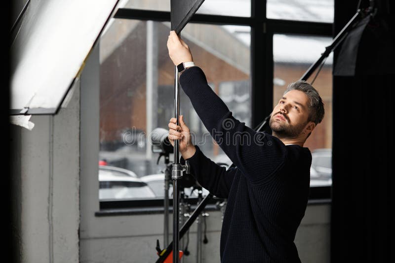 Creative Professional Adjusting Lighting Equipment in Stock Image ...