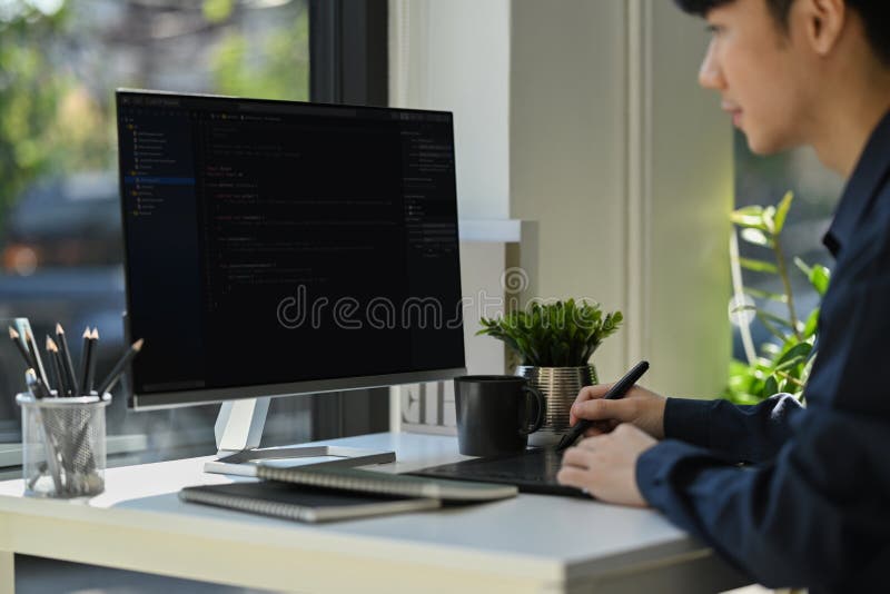 Skilled Programmer Working On Web Site Project In A Software Developing On Desktop Computer At
