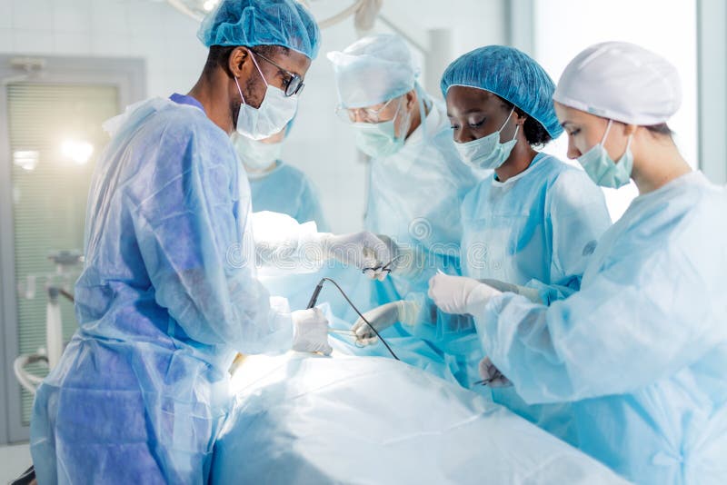 Skilled and Registered Doctors Doing Medical Procedure Stock Photo ...