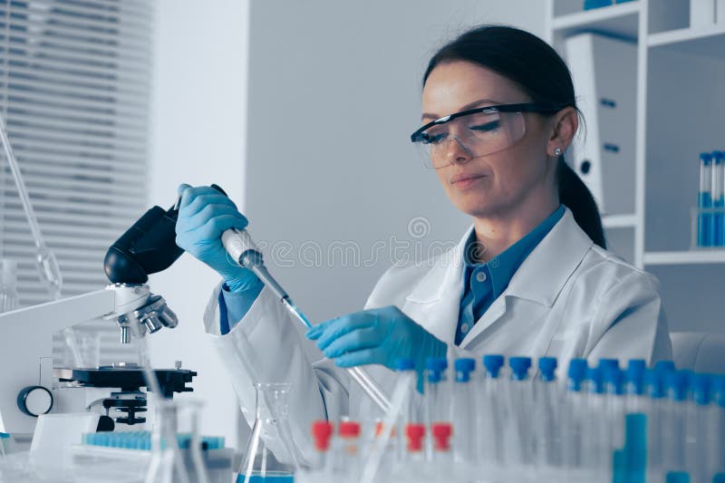 A Skilled Research Scientist Conducts Complex Experiments in a Modern ...