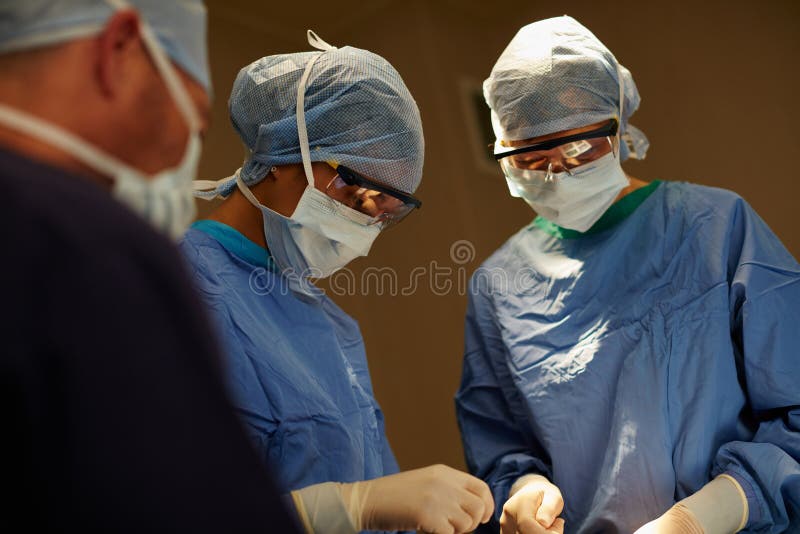 Skilled in Saving Lives. a Team of Surgeons Performing a Surgical ...