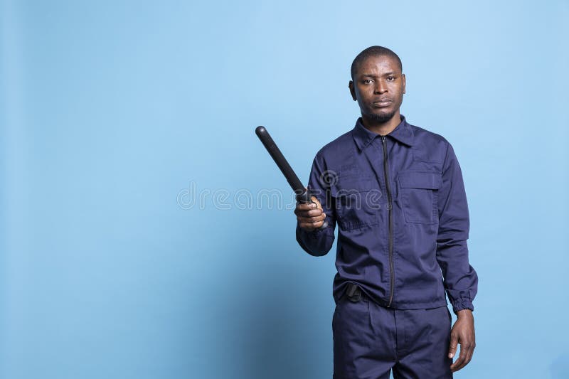 African American Bodyguard Posing Baton Uniform Studio Stock Photos ...
